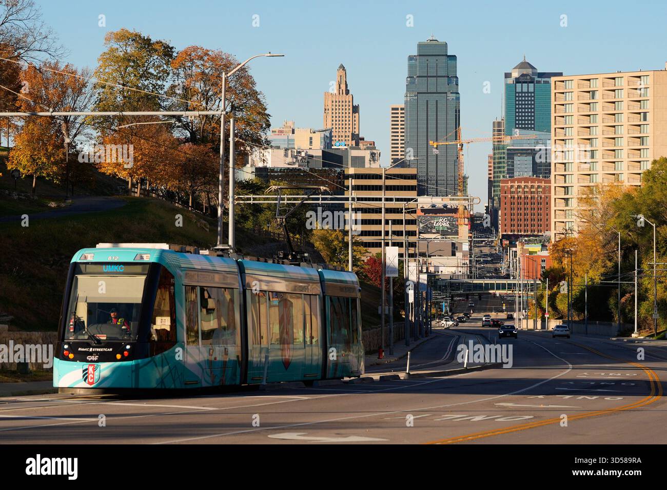 A streetcar runs along Main Street near the 18th and Vine district ...