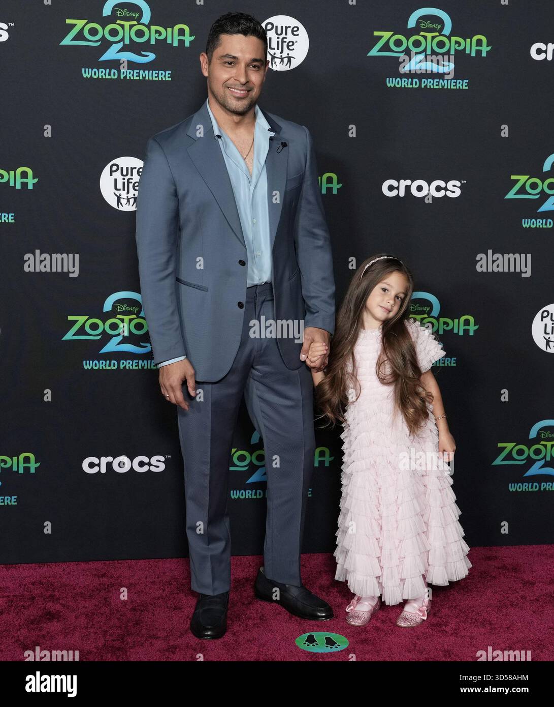 (L-R) Wilmer Valderrama and Nakano Valderrama arrives at the Walt ...