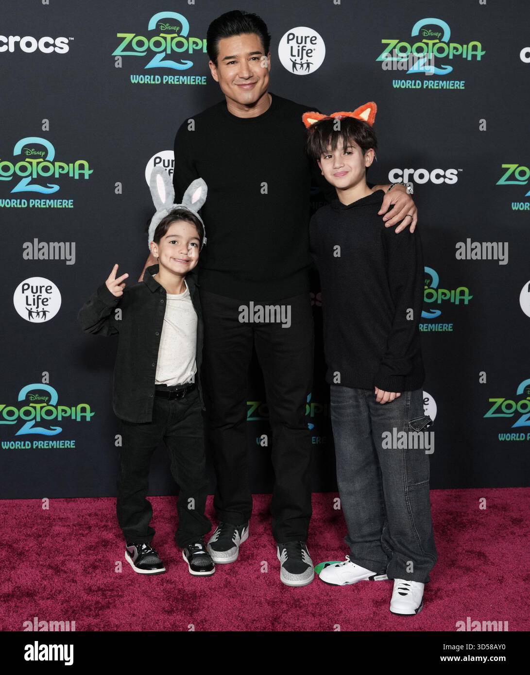 (L-R) Santino Lopez, Mario Lopez, and Dominic Lopez arrives at the Walt ...
