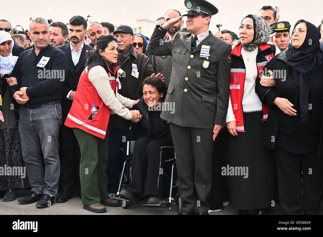 Relatives mourn during the funeral of Turkish military personnel Umit ...