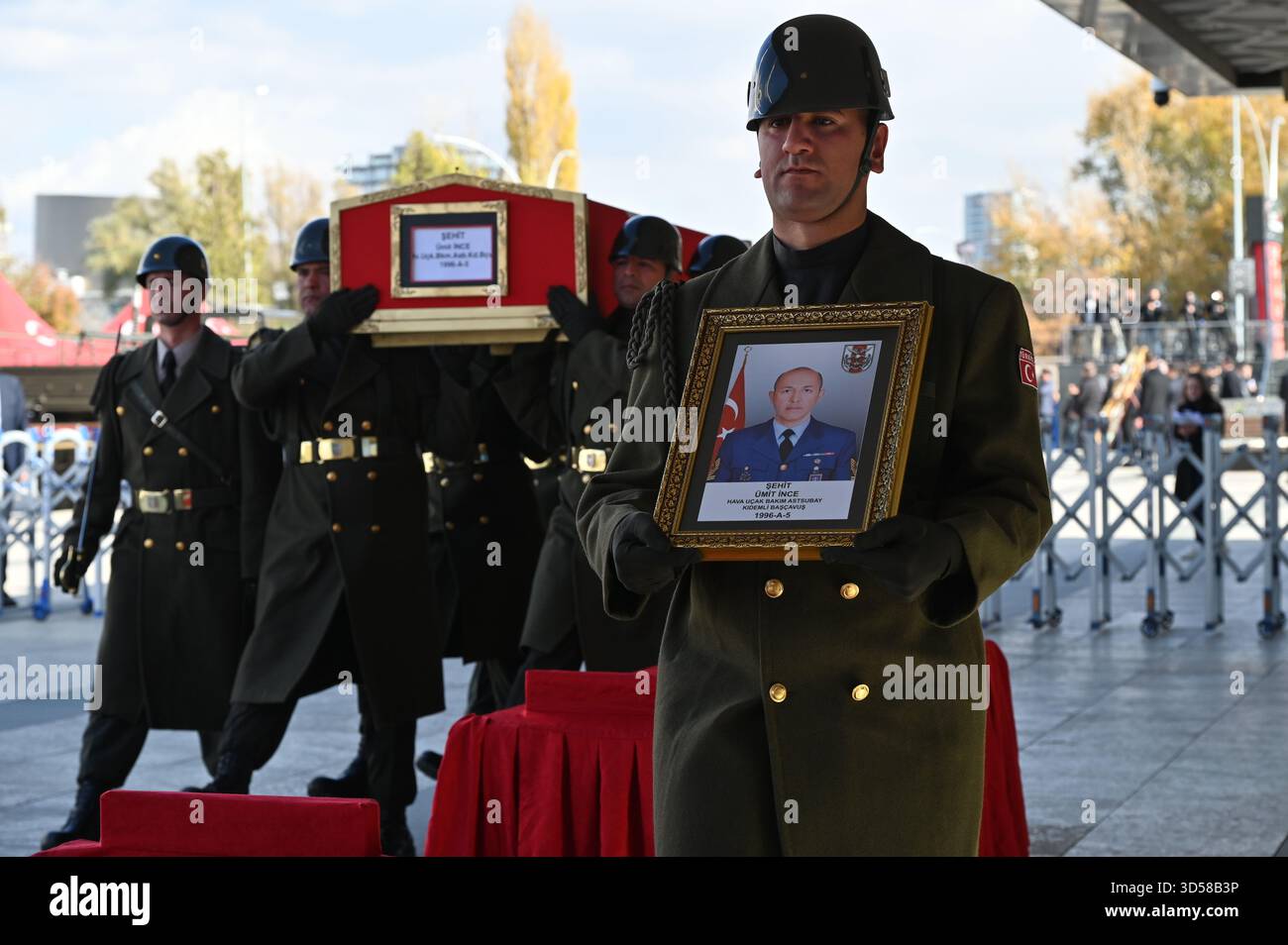 Turkish soldiers carry the coffin of Umit Ince during the funeral of ...