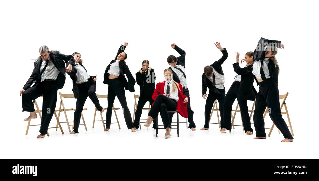 Business team performing expressive synchronized poses around confident ...