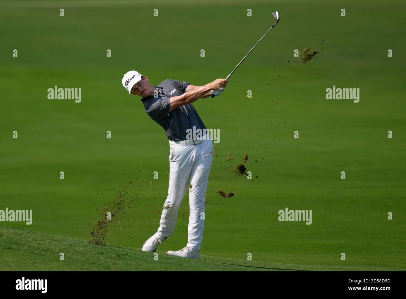 Daniel Hillier of New Zealand plays his second shot on the 5th hole ...