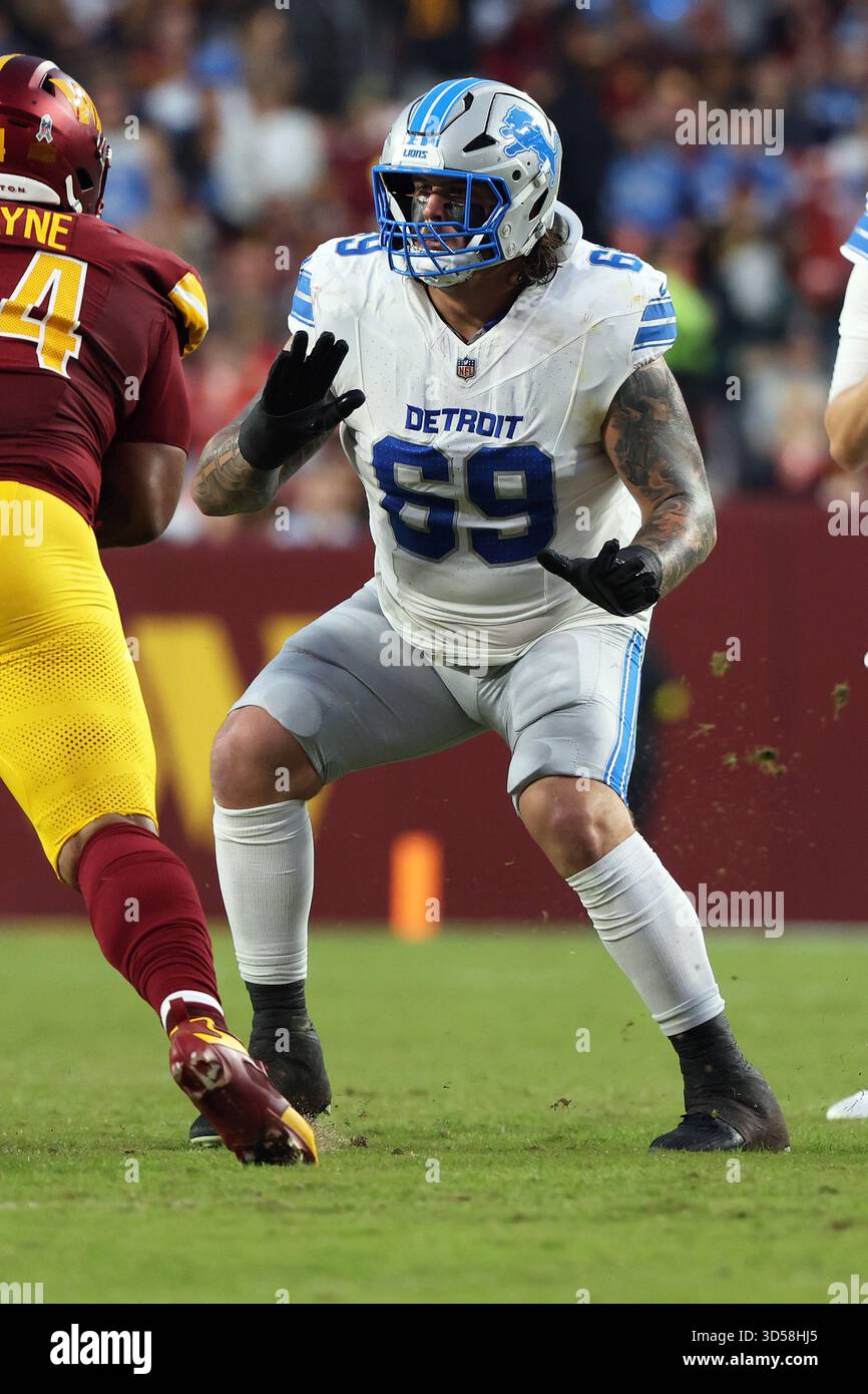 Detroit Lions guard Tate Ratledge (69) blocks during an NFL football ...
