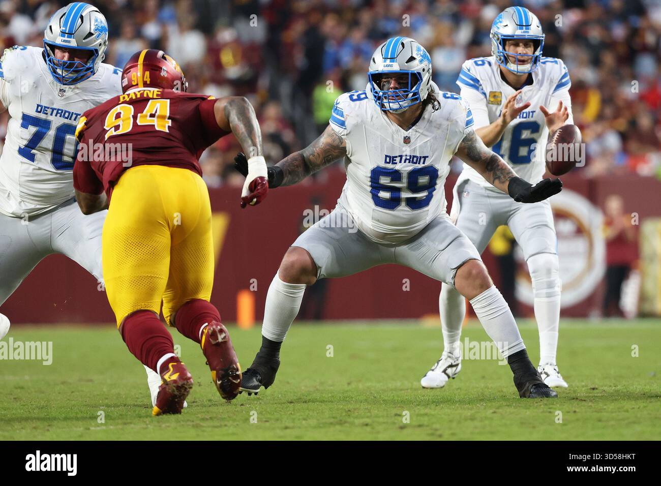 Detroit Lions guard Tate Ratledge (69) blocks during an NFL football ...