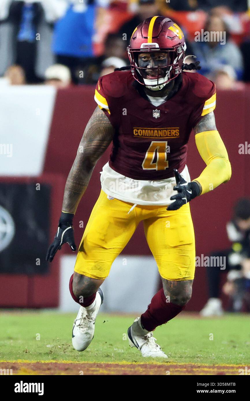 Washington Commanders linebacker Frankie Luvu (4) rushes during an NFL ...