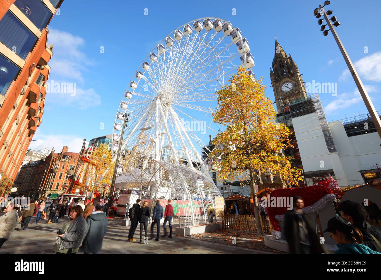 Visitors explore the 2025 Christmas market in Manchester city center on ...