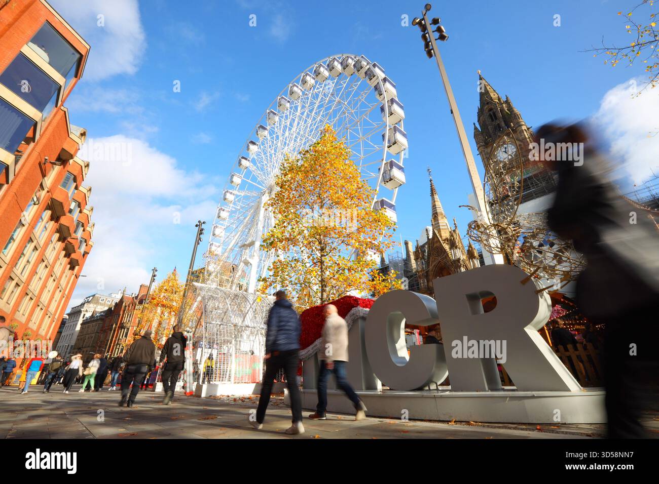 Visitors explore the 2025 Christmas market in Manchester city center on ...