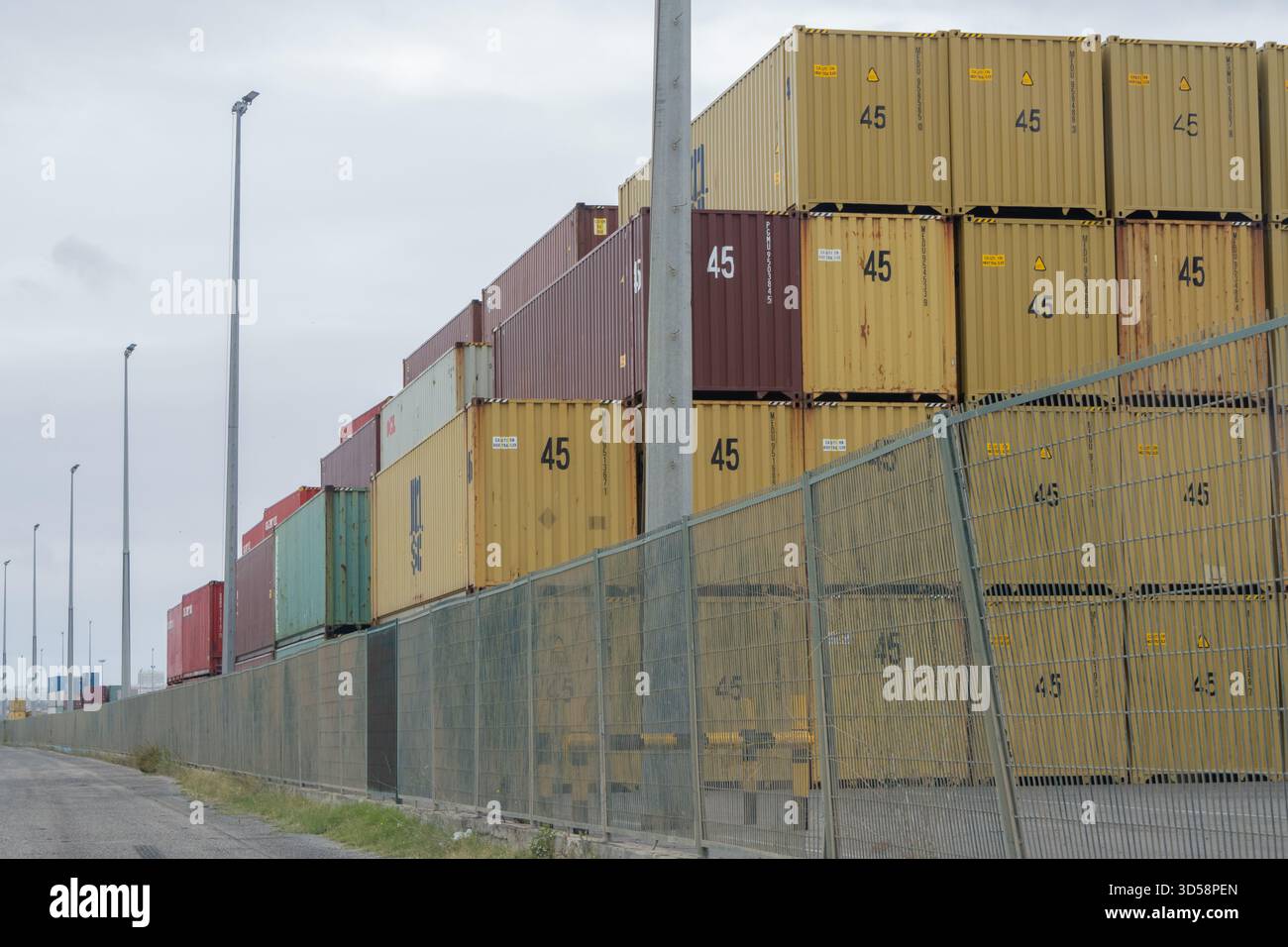 Stacked shipping containers filling hi-res stock photography and images ...