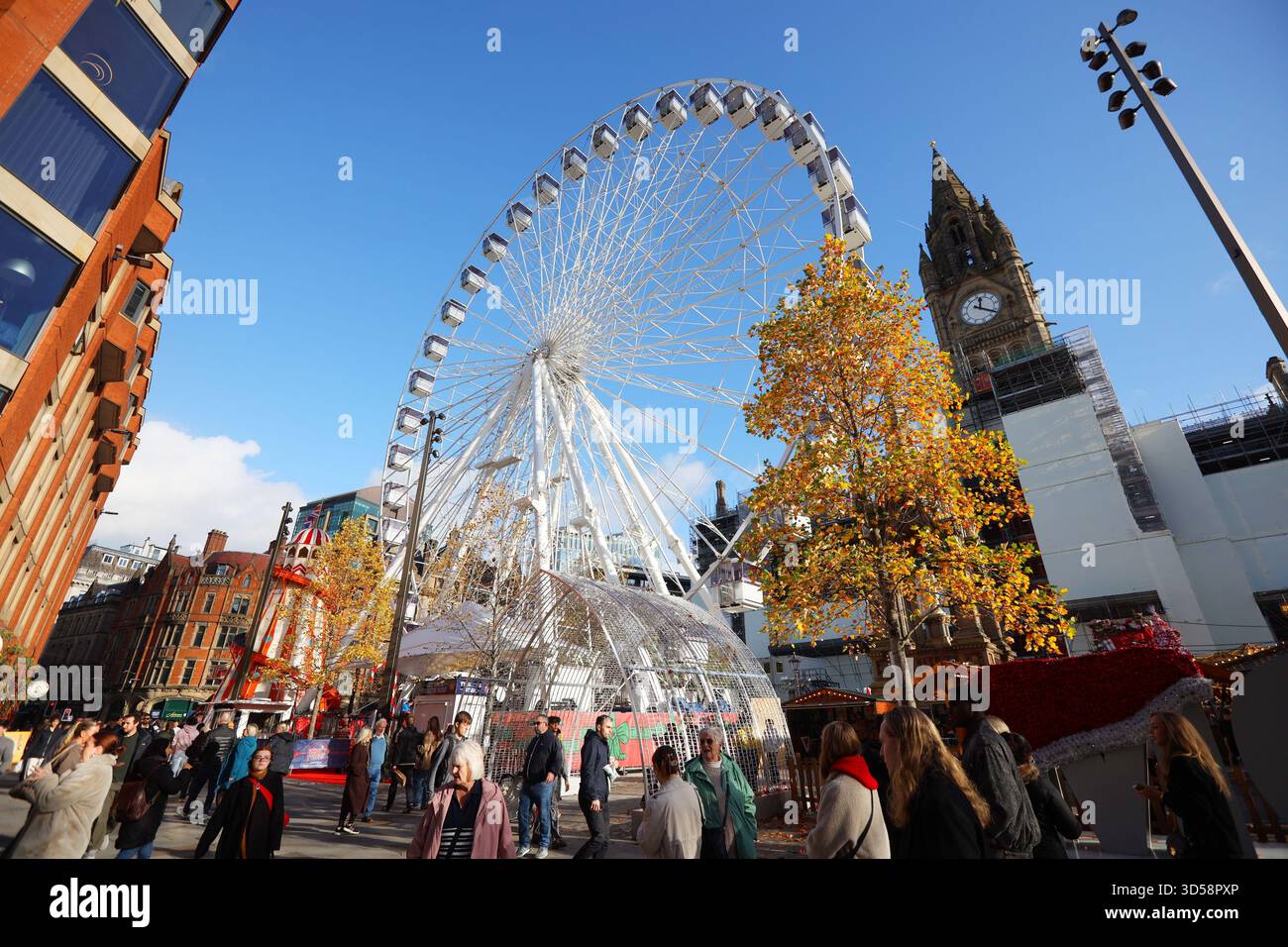 Visitors explore the 2025 Christmas market in Manchester city center on ...