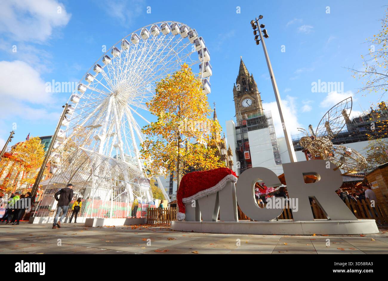 Visitors explore the 2025 Christmas market in Manchester city center on ...