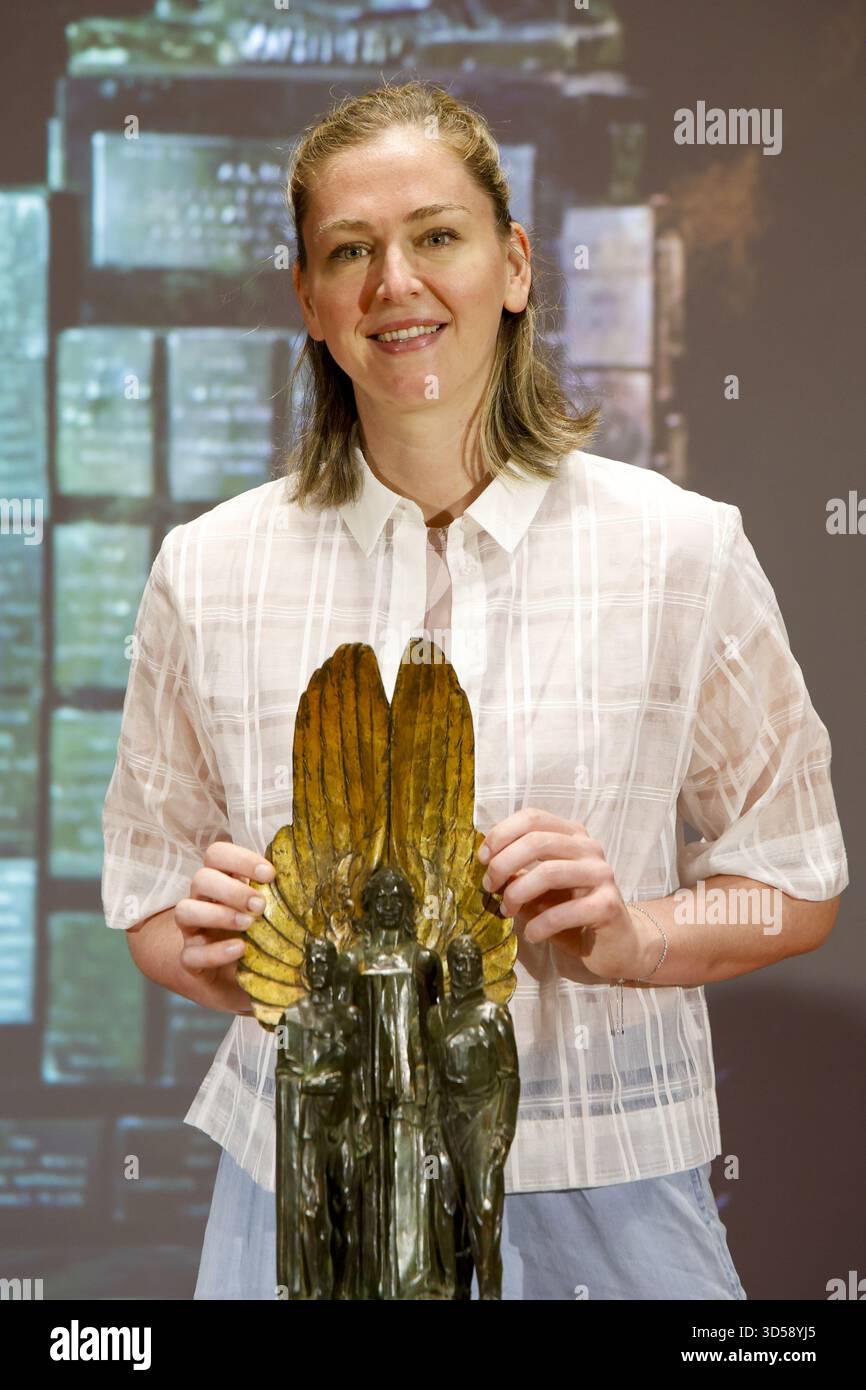 Belgium's Emma Meesseman poses with the trophy at the award ceremony ...