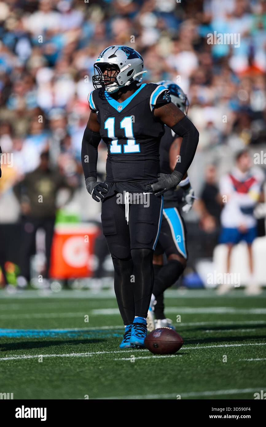 Carolina Panthers linebacker Nic Scourton (11) looks to the sideline ...