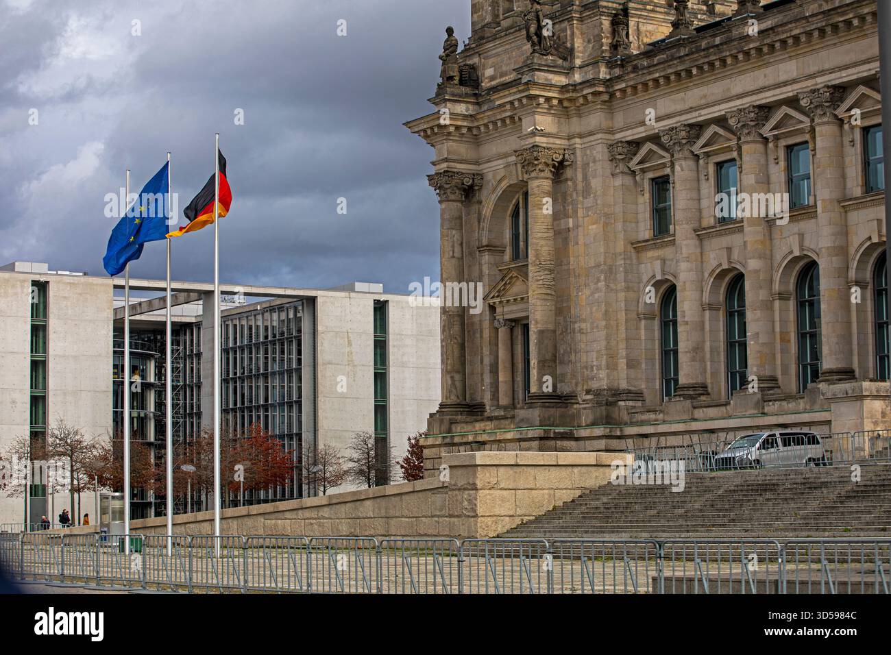 NATO and German flags in cloudy weather at the seat of the German ...