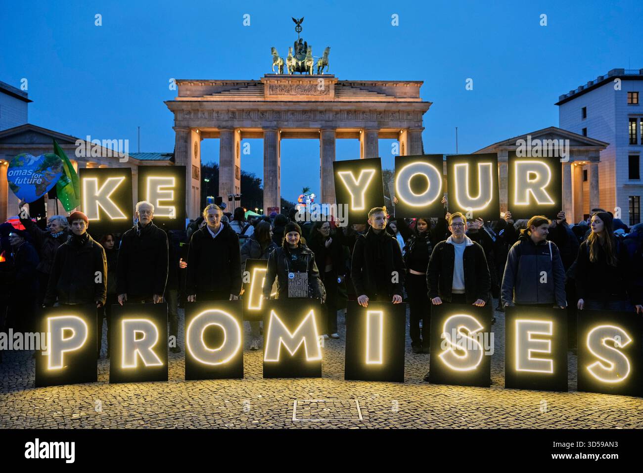 People take part in the yearly protest for climate justice in front of ...