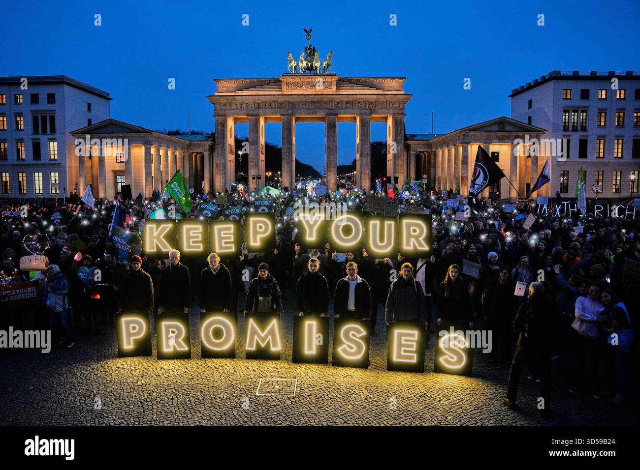 People take part in the yearly protest for climate justice in front of ...