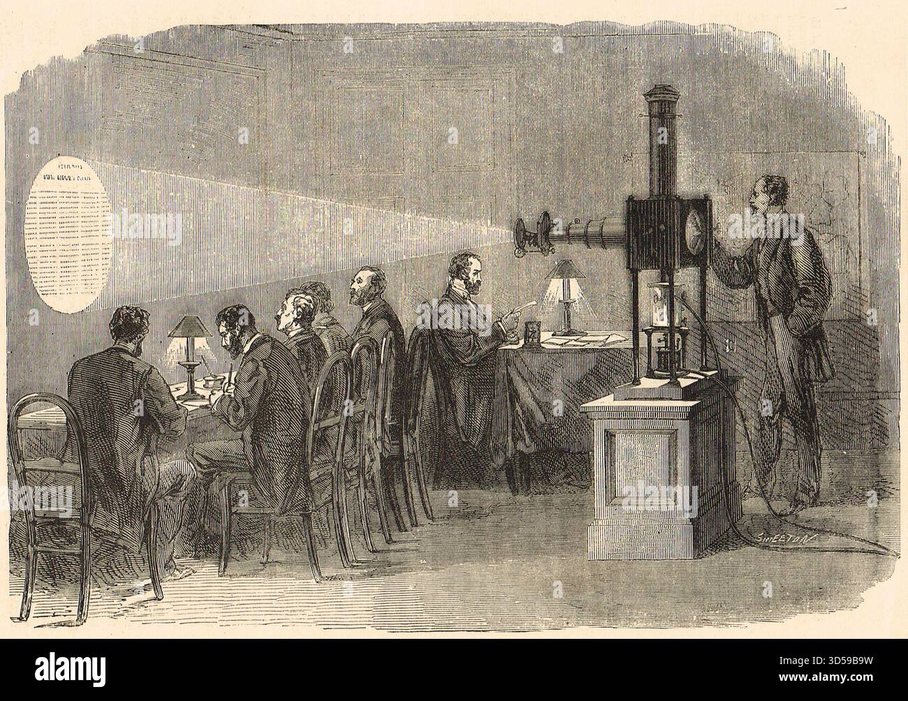 French intelligence officers reading microfilm messages using a ...