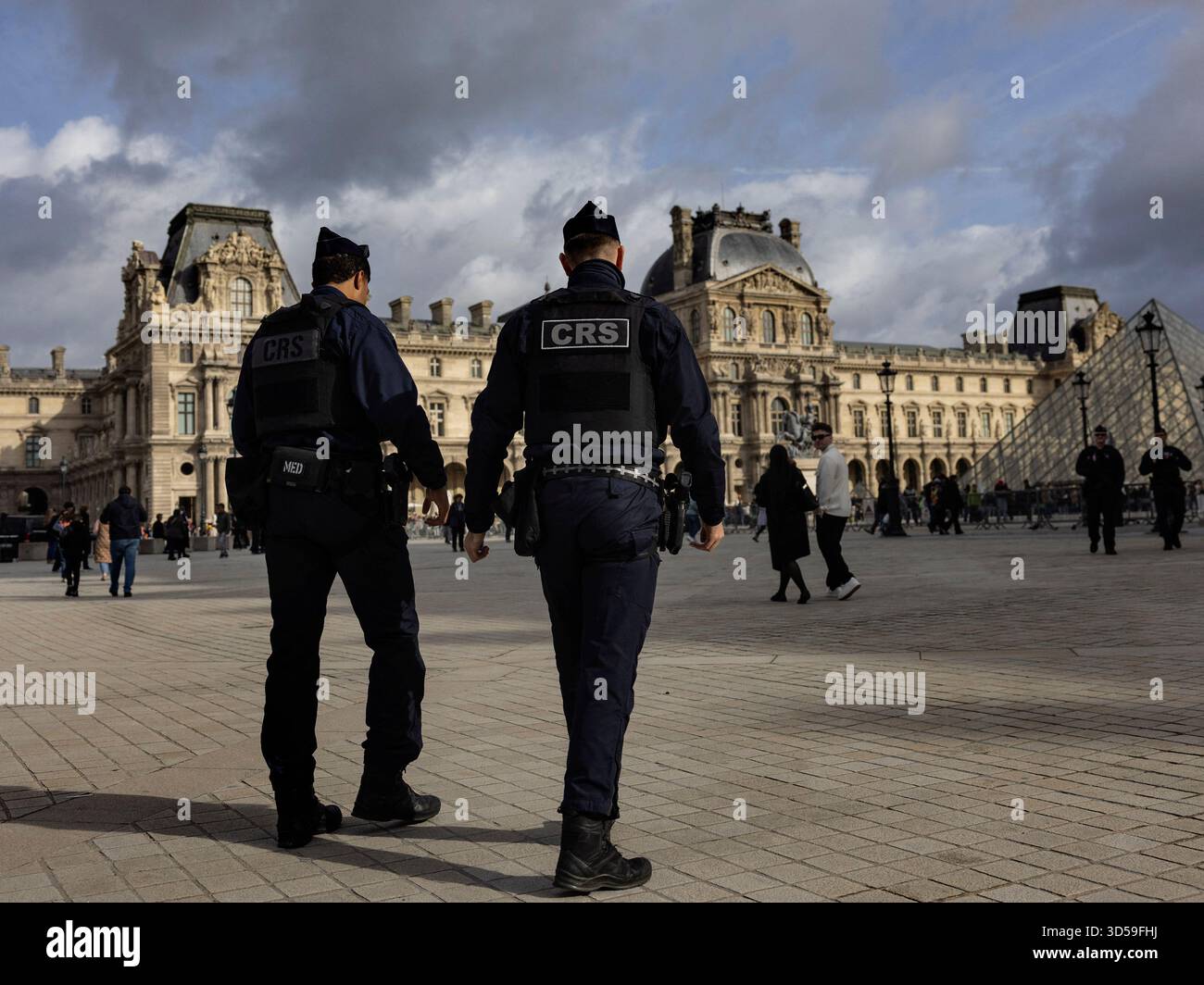 French police forces are visible after the theft of jewelry from the ...