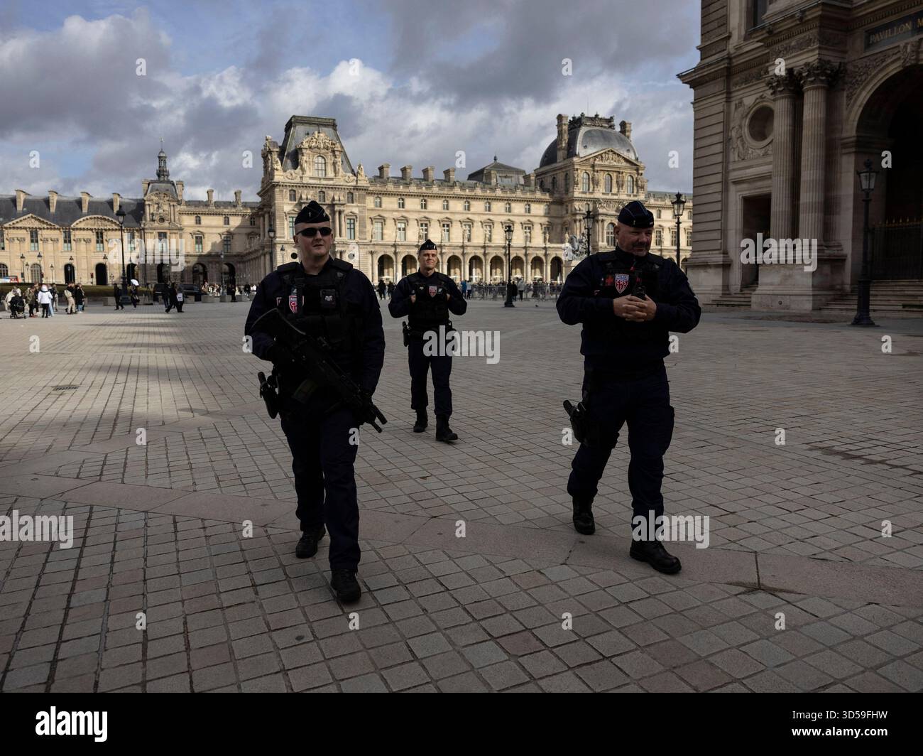 French police forces are visible after the theft of jewelry from the ...