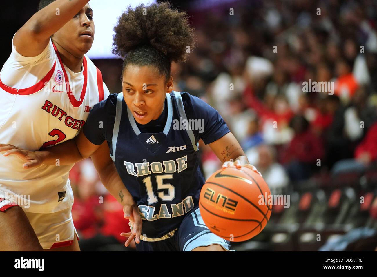 Rhode Island guard Sophia Vital (15) drives the ball down the court ...