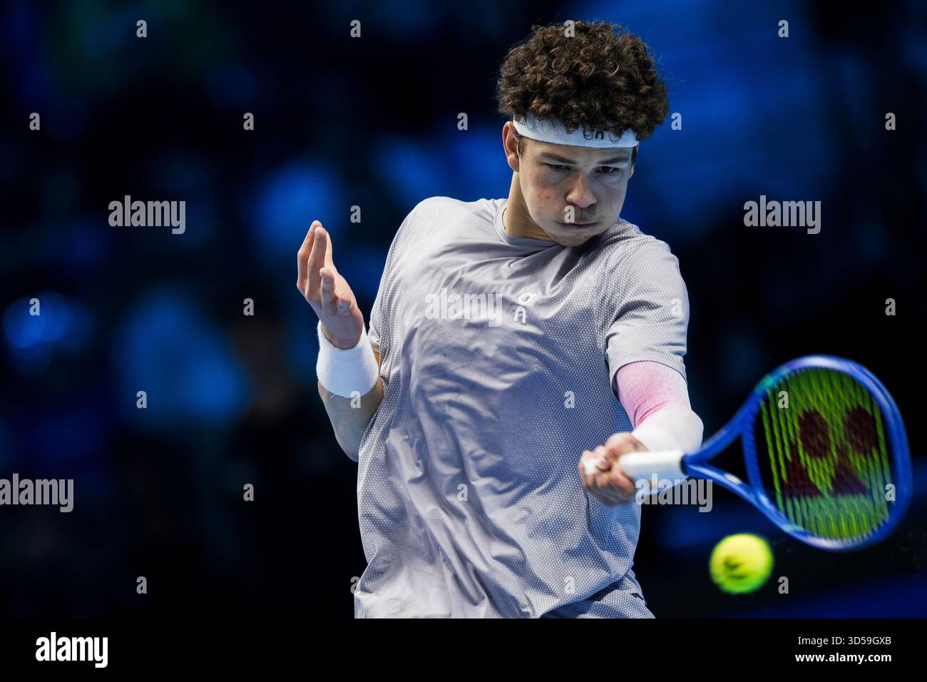 Ben Shelton of USA plays a forehand during his round robin singles match against Jannik Sinner ...