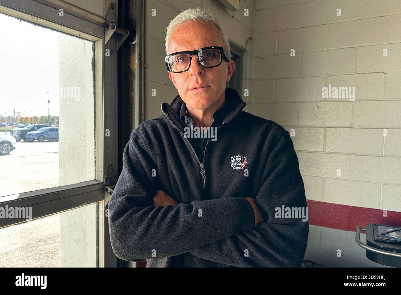 Sean Garber, CEO of Grade A Auto Parts Recycling, stands for a portrait ...