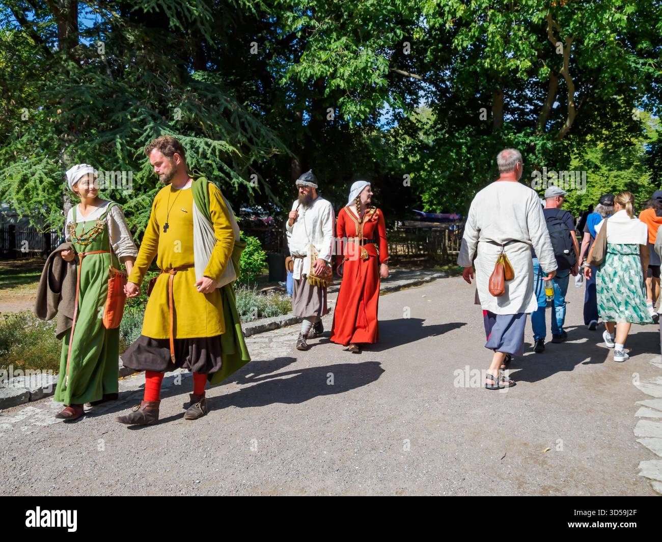 Visby, Sweden - Aug 10, 2024: People in medieval costumes on the street ...