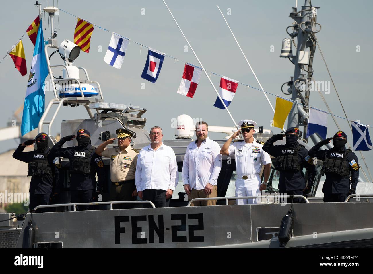 Guatemalan President Bernardo Arevalo, center, and U.S. ambassador ...