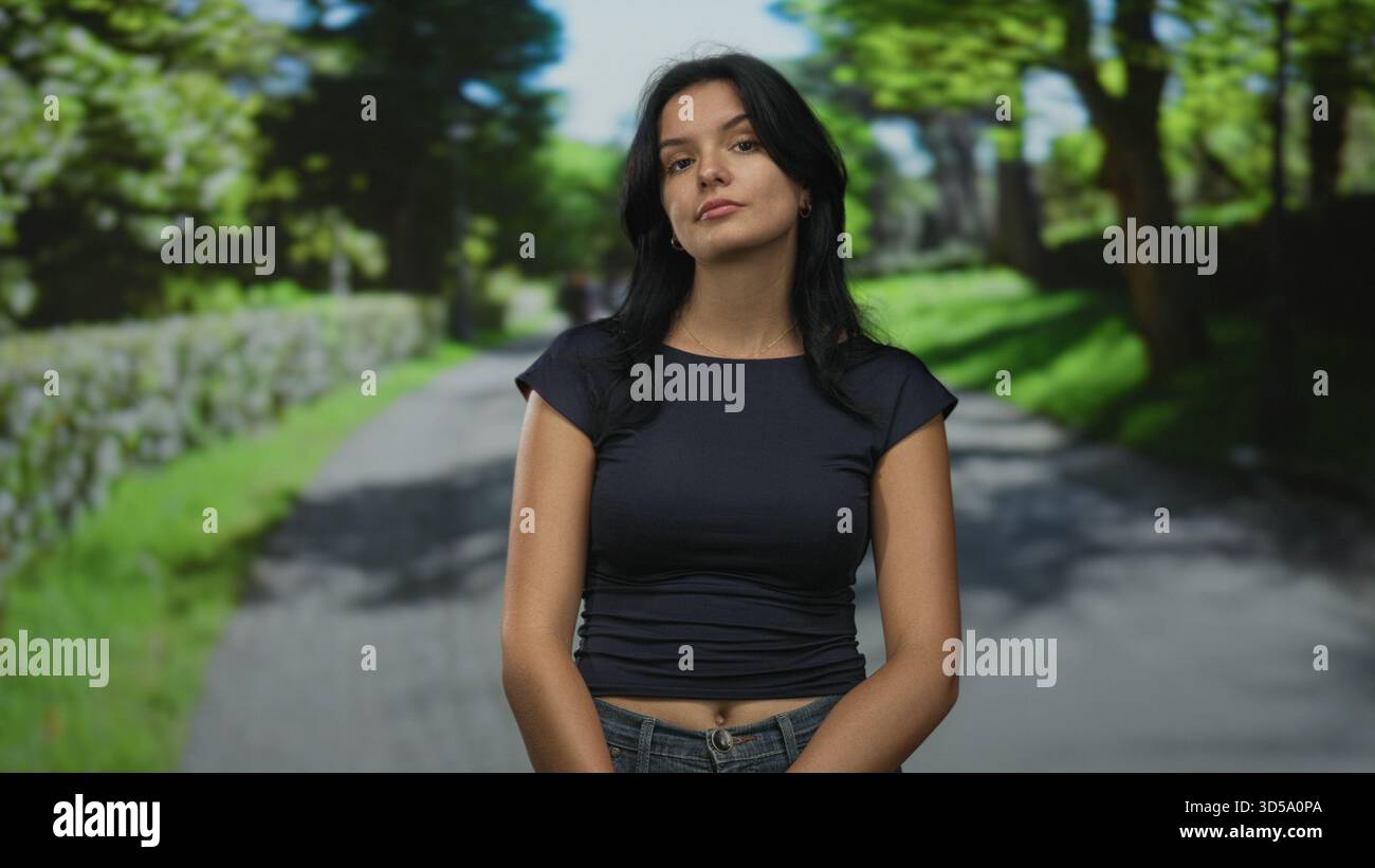 Woman midriff tilts head hi-res stock photography and images - Alamy