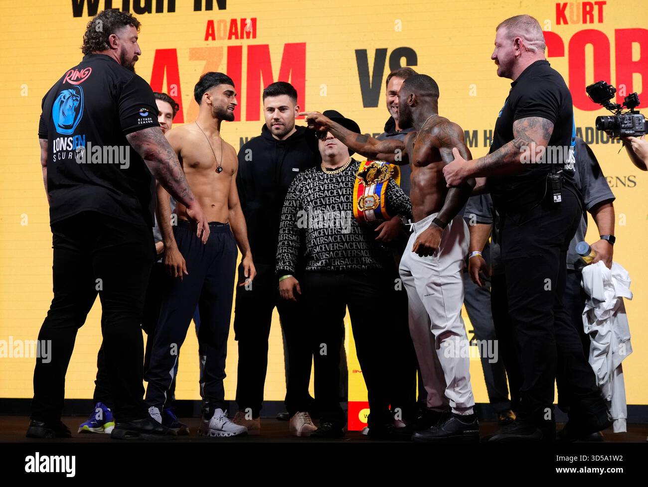 Adam Azim (left) and Kurt Scoby during the weigh-in at York Hall ...