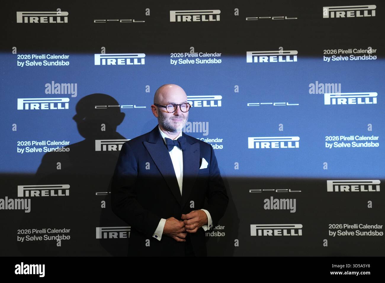 Photographer Solve Sundsbo poses for a photo during the 2026 Pirelli ...