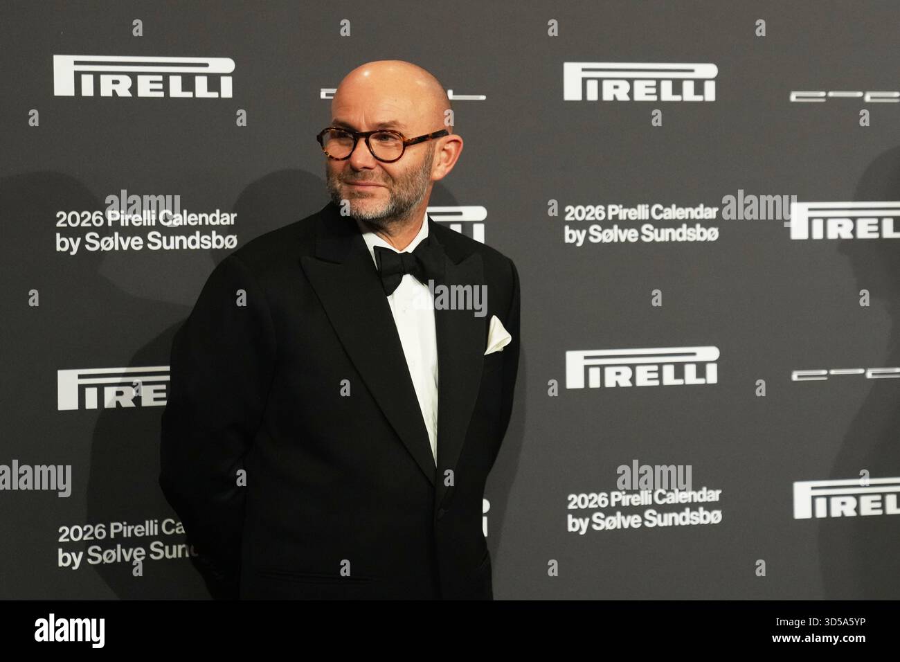 Photographer Solve Sundsbo poses for a photo during the 2026 Pirelli ...