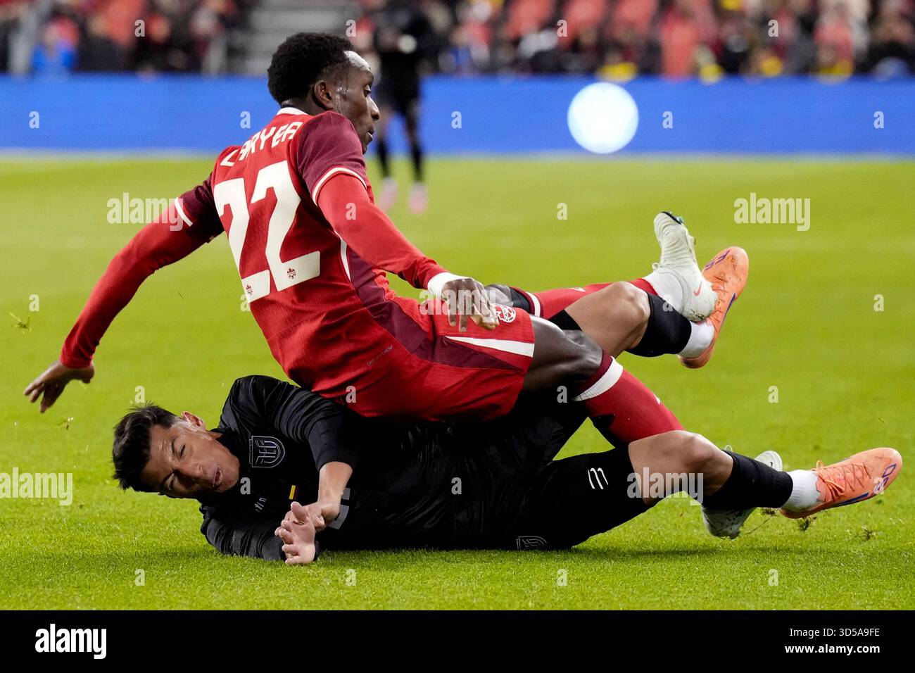 Canada's Richie Laryea is tackled by Ecuador's Alan Franco Palma during ...