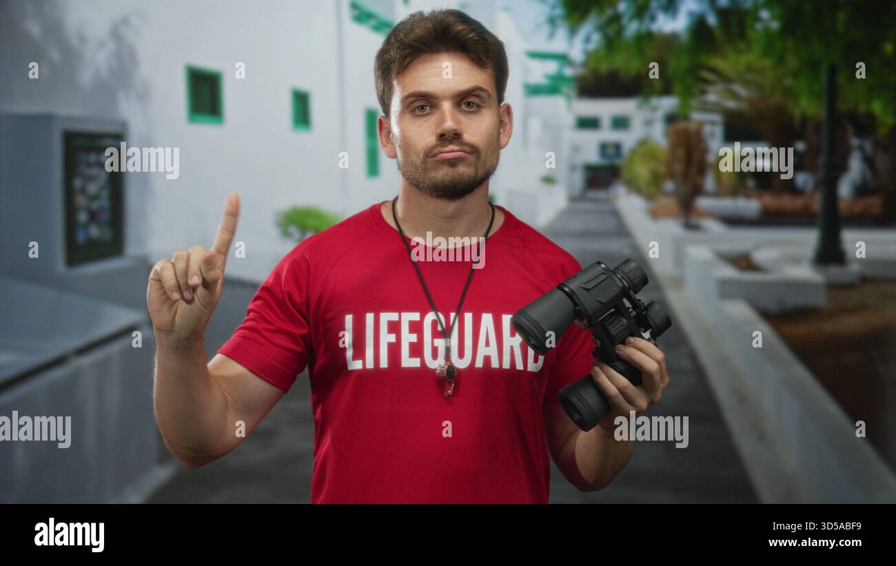 Lifeguard man points finger hi-res stock photography and images - Alamy