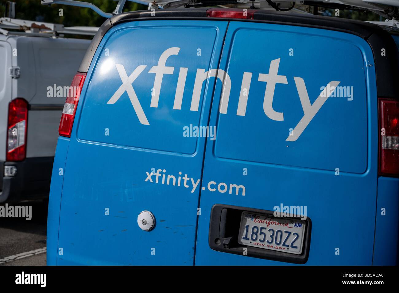 Xfinity Comcast logo on rear of van in Walnut Creek, California, October 27, 2025. (Photo by ...