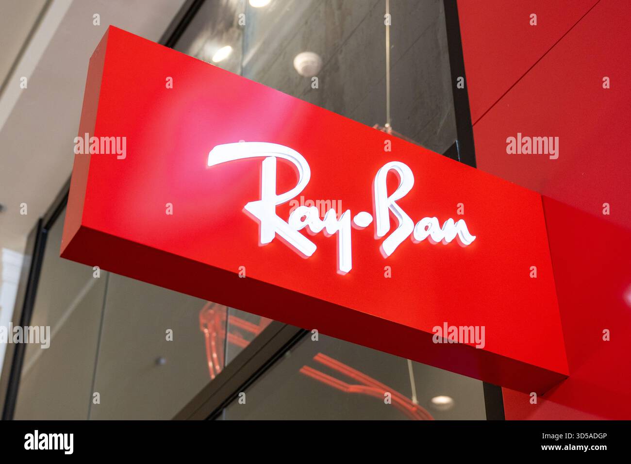 Ray-Ban storefront sign with illuminated white logo inside shopping ...