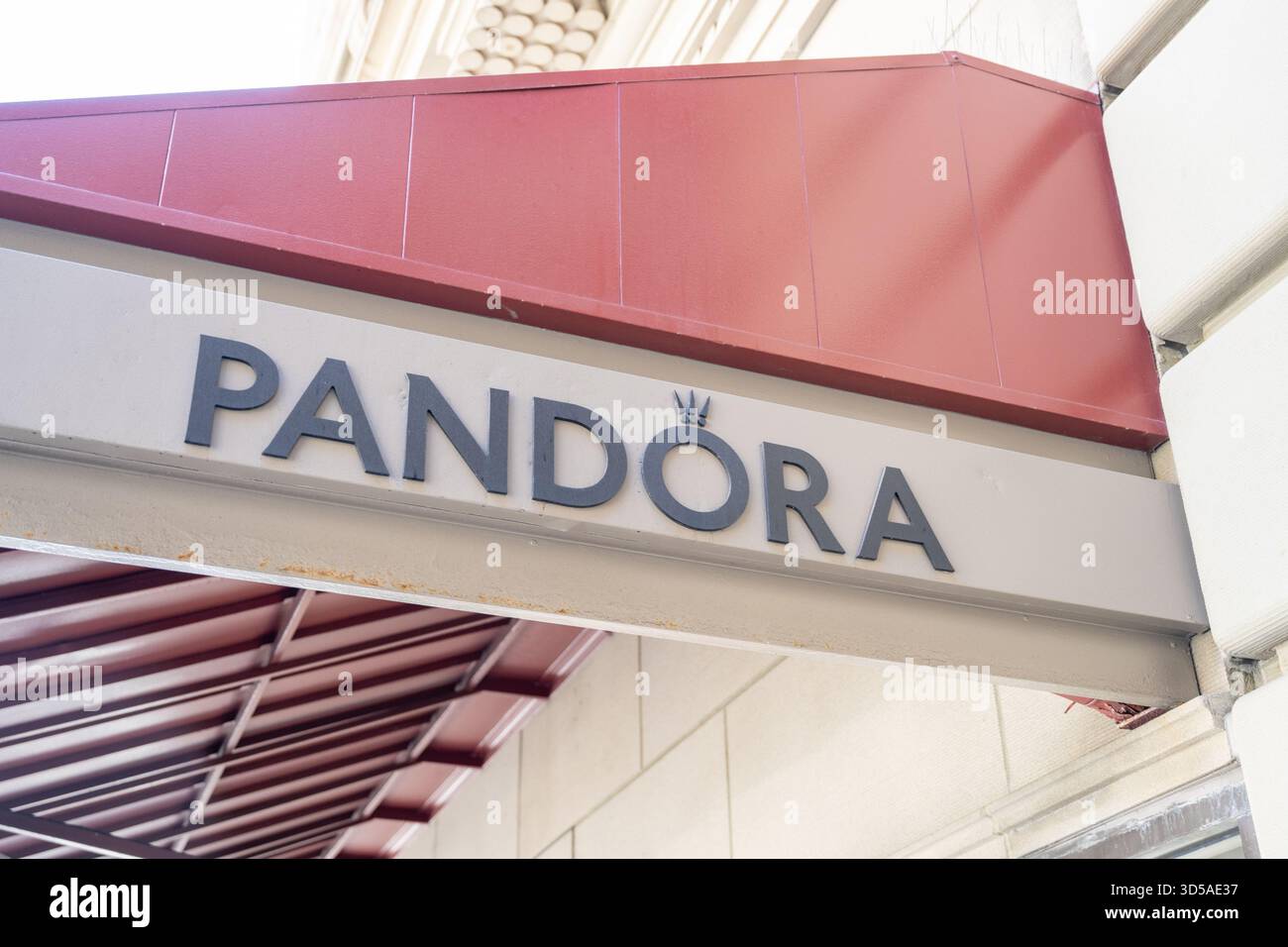 Exterior sign for Pandora jewelry store under red awning, San Francisco ...
