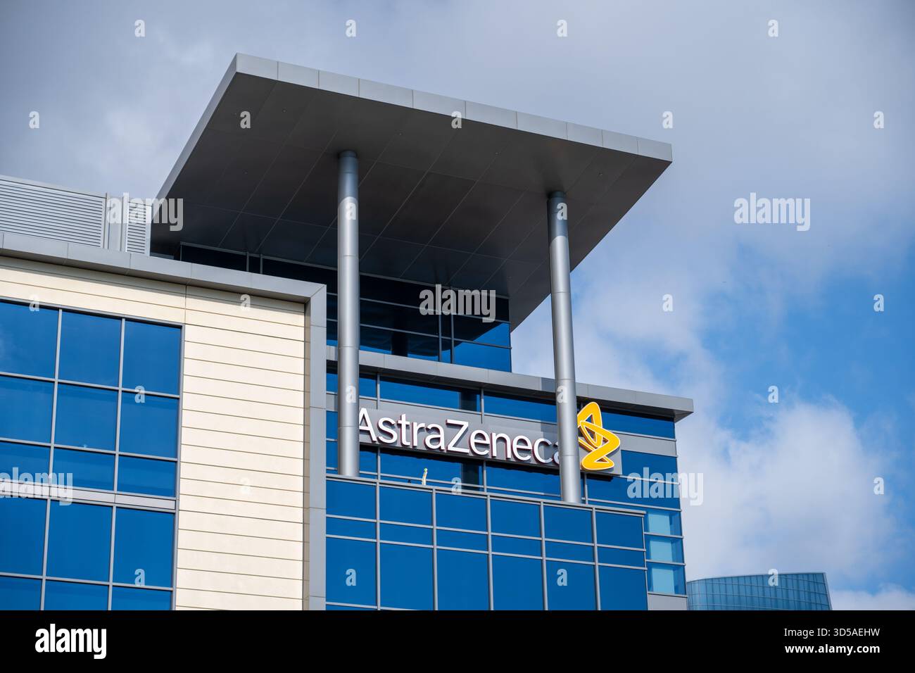 AstraZeneca sign on modern glass office building exterior with metal ...