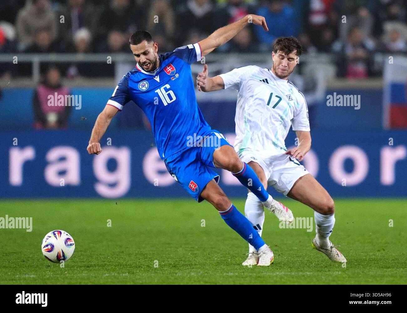 Slovakia's David Hancko (left) and Northern Ireland's Paddy McNair ...