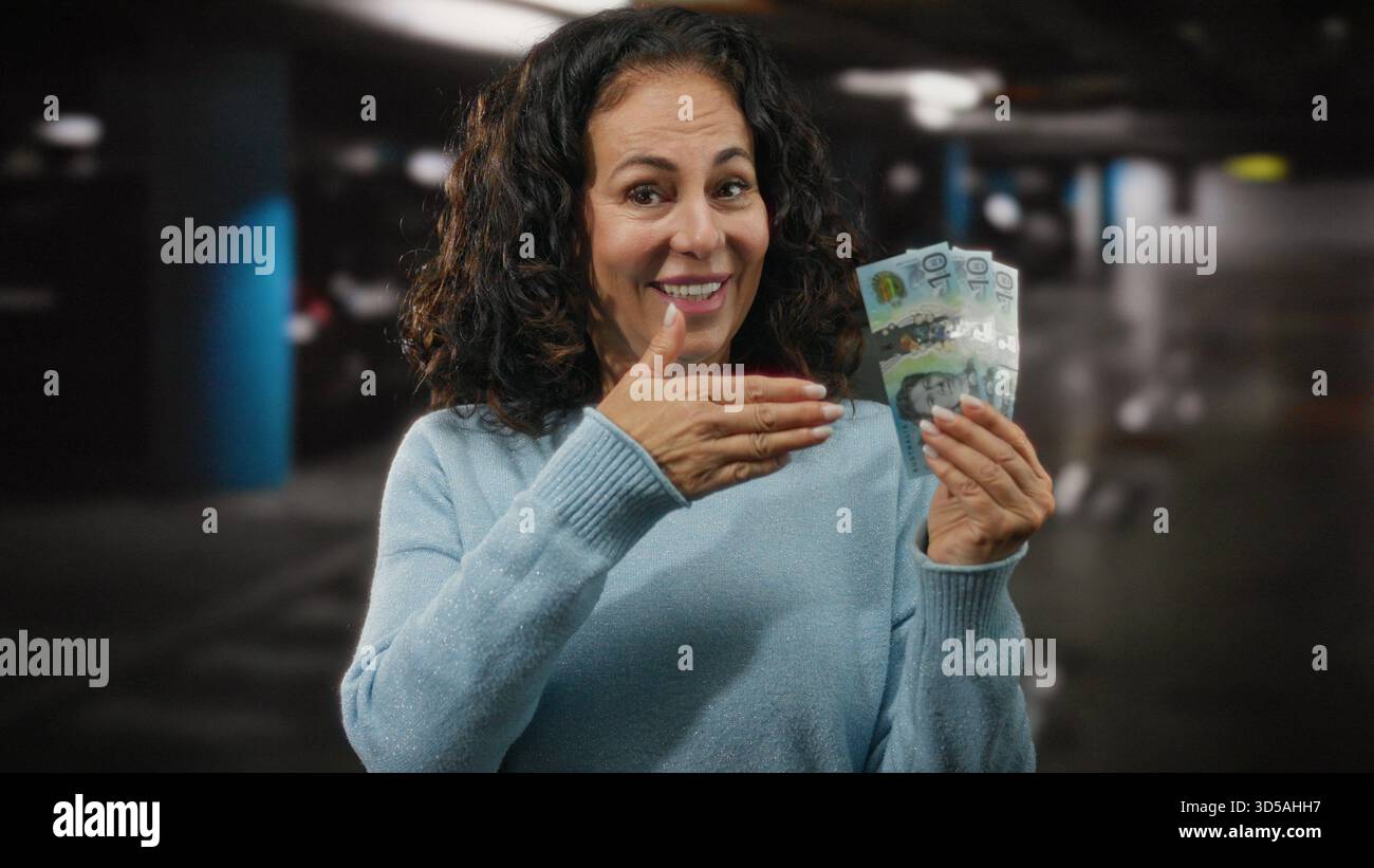 Middle aged woman holds australian hi-res stock photography and images ...