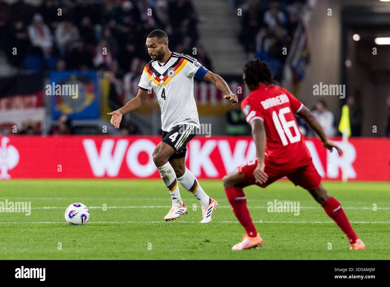 Jonathan Tah (Germany, 4) on the ball, Leandro Barreiro (Luxembourg, 16 ...