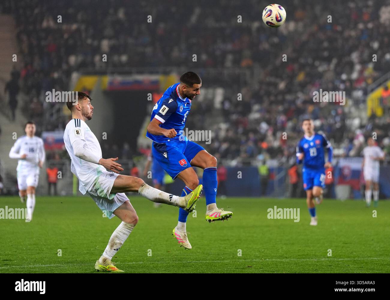 Slovakia's David Hancko (centre) in action during the 2026 FIFA World ...