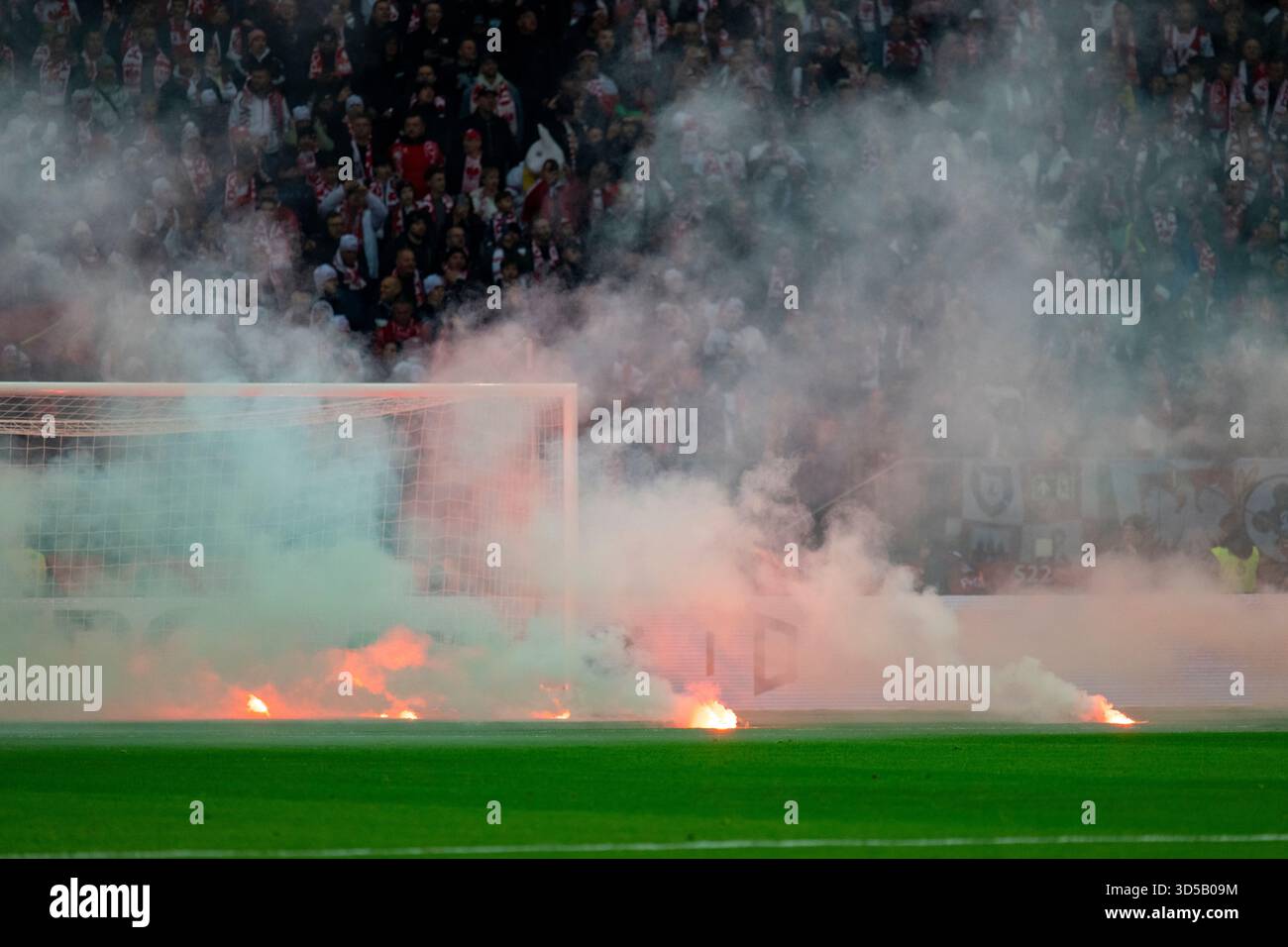 Polish fans throw flares onto the field during the FIFA World Cup 2026 ...