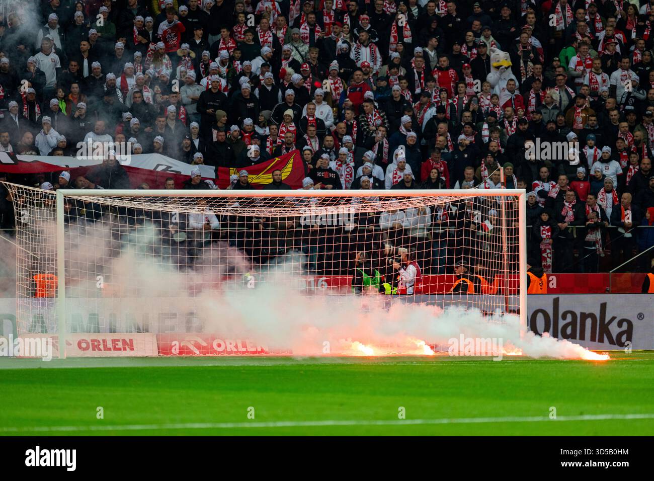 Polish fans throw flares onto the field during the FIFA World Cup 2026 ...