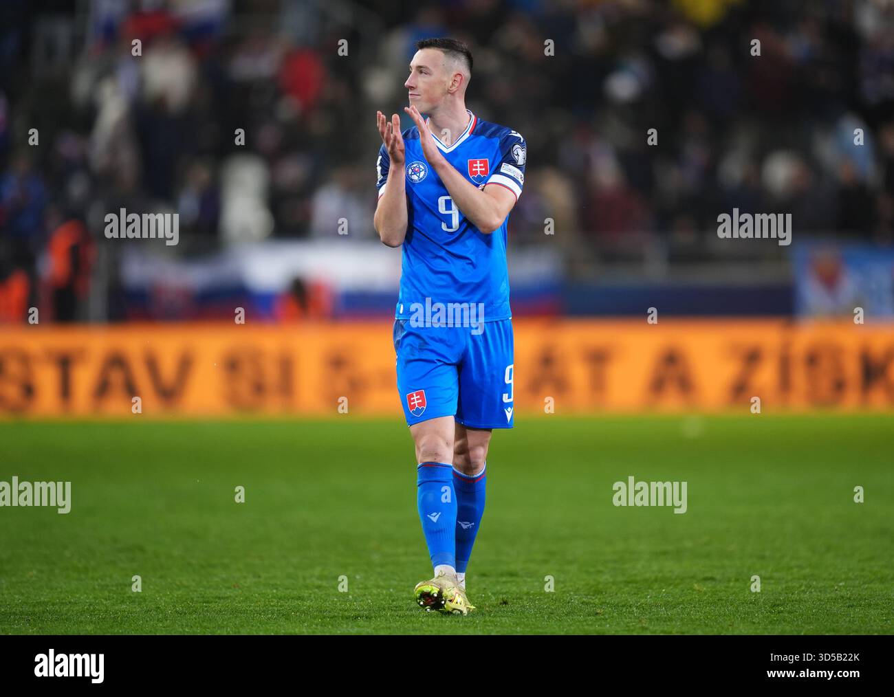 Slovakia's Robert Bozenik applauds the fans following the 2026 FIFA ...