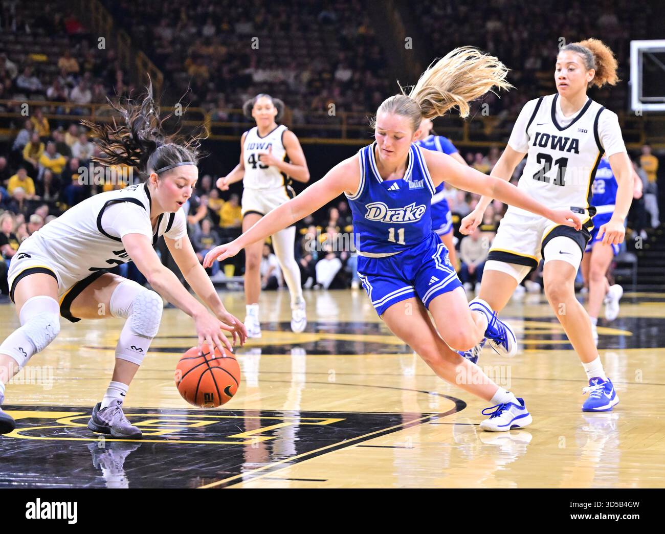 IOWA CITY, IA - NOVEMBER 13: Iowa guard Taylor McCabe (2) grabs a loose ...