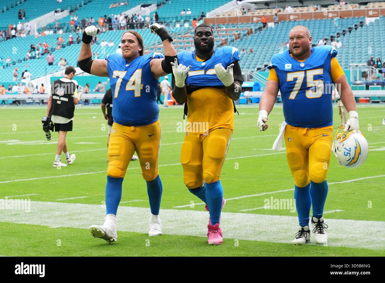Los Angeles Chargers offensive tackle Austin Deculus (74) guard Mekhi ...