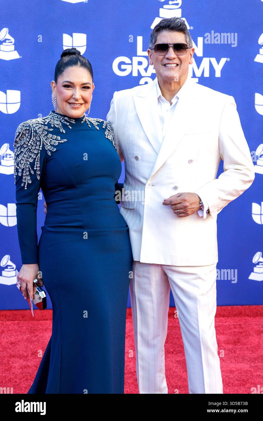 Eddie Herrera (R) and guest attend the Latin Grammy Awards at the MGM ...
