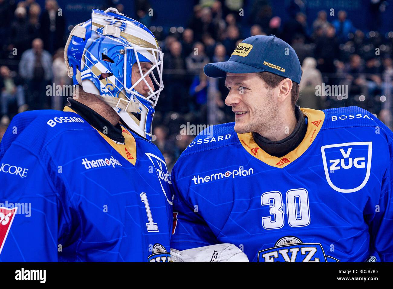 Goaltender Tim Wolf #1 (EV Zug) and Goaltender Leonardo Genoni #30 (EV ...