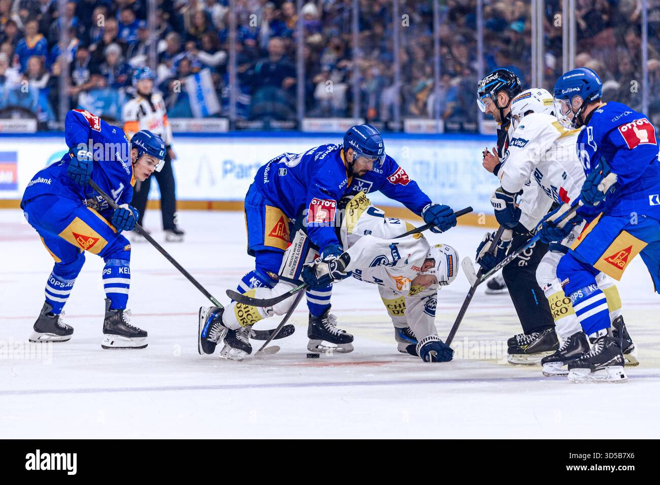 Jan Kovar #43 (EV Zug) pulls Manix Landry #13 (HC Ambri-Piotta) away ...